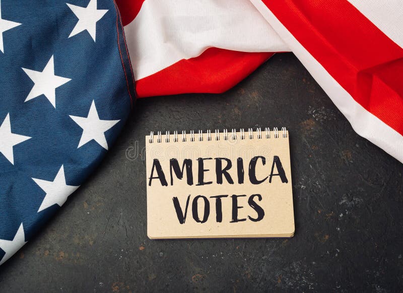 A Table with a Notebook that Says America Votes Stock Image - Image of ...
