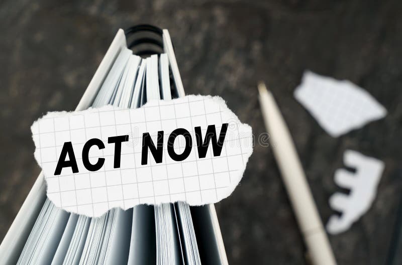 On the Table is a Notebook on Which Lies a Piece of Torn Paper with the ...