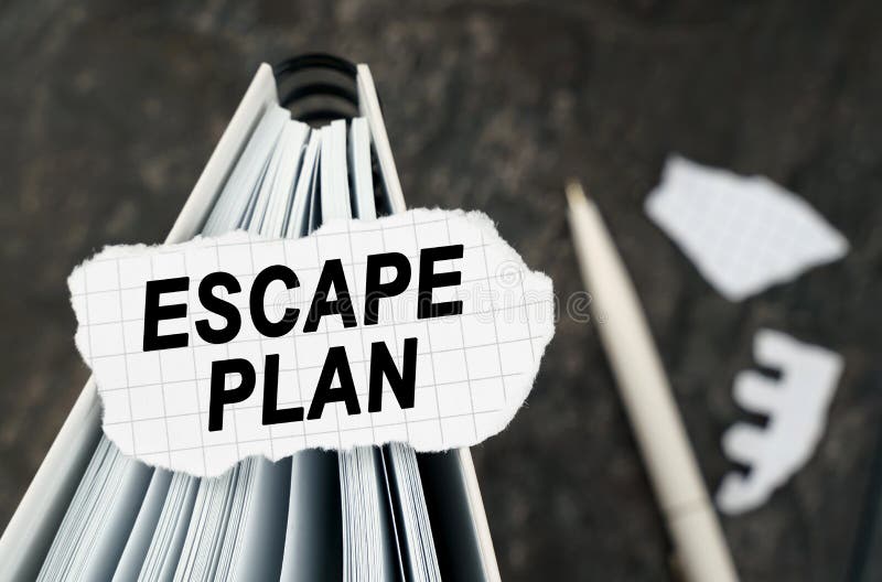 On the Table is a Notebook on Which Lies a Piece of Torn Paper with the ...