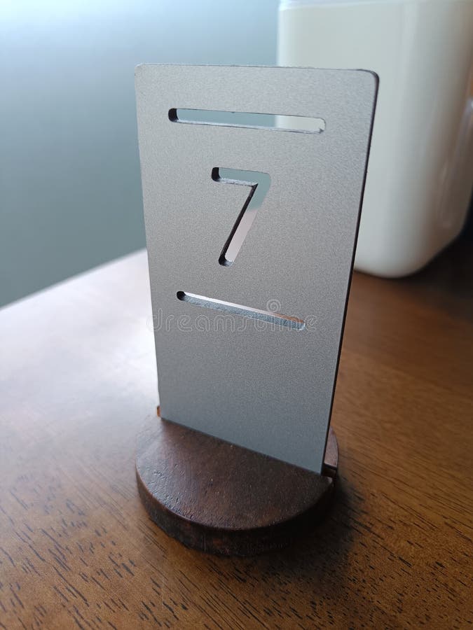 Table Number Seven Made of Iron in a Restaurant Stock Image - Image of ...