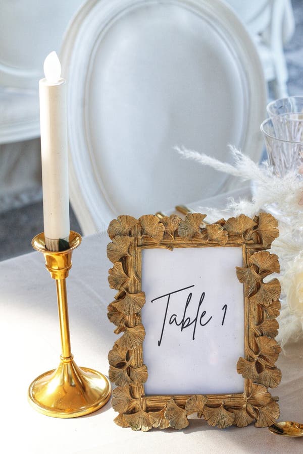 Table One Sign in Golden Frame Stock Photo - Image of white, sign ...