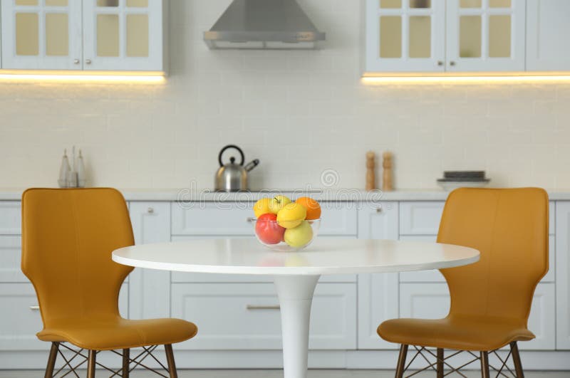 Table with Orange Chairs in Kitchen Interior Stock Image - Image of ...