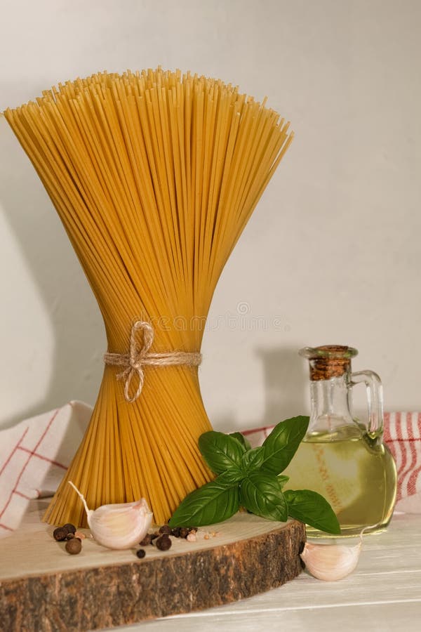 On the Table is a Pack of Spaghetti Tied with String Stock Image ...