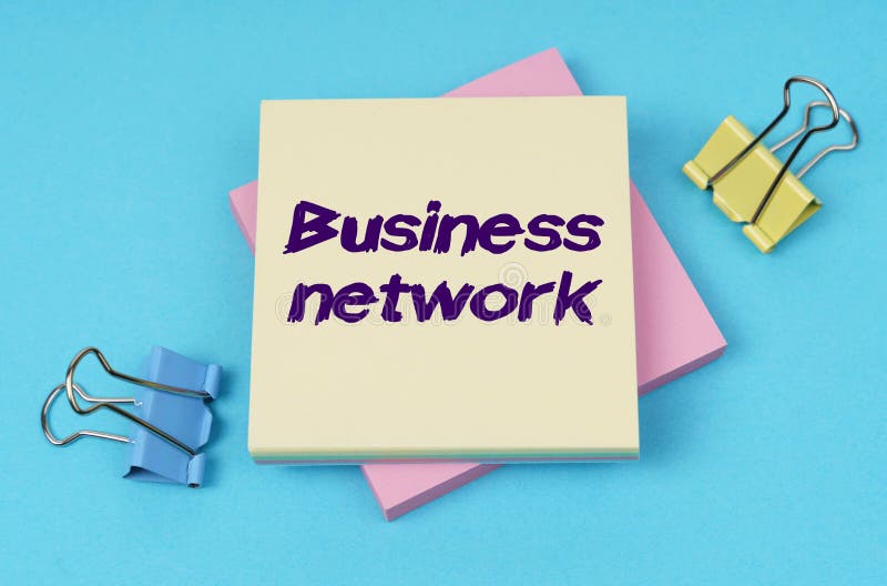 On the Table are Paper Clips, Note Paper with Text - Business Network ...