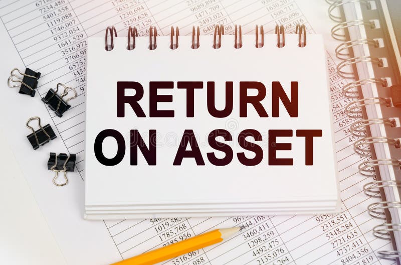 On the Table is a Pen and a Notebook with Inscriptions - RETURN on ...