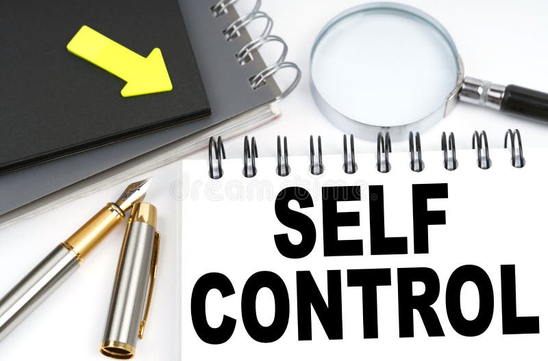 On the Table are a Pen and a Notebook with the Inscriptions - Self ...