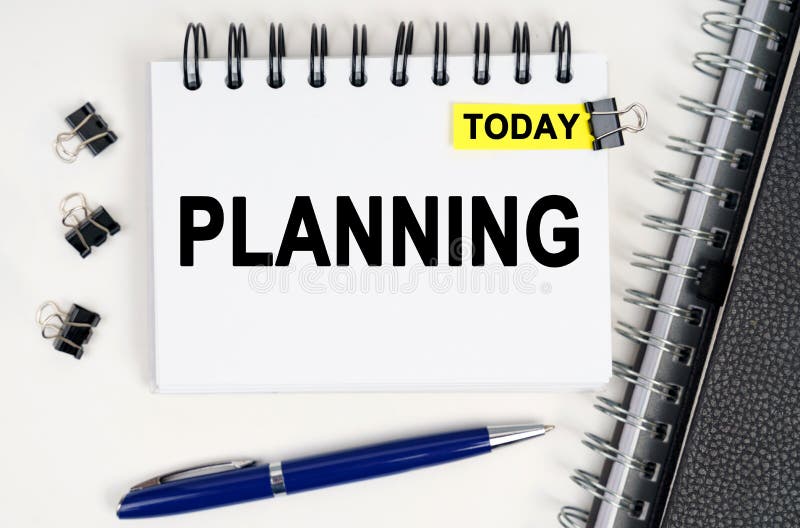 On the Table is a Pen and a Notebook with Inscriptions - Today and ...