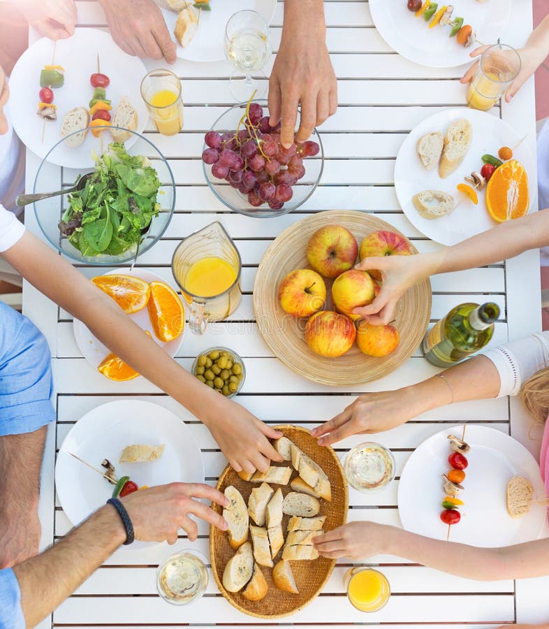 The table of people eating stock photo. Image of food - 93156918