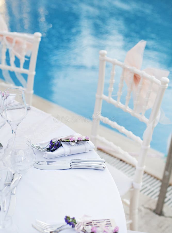 Table Prepared for the Wedding Invitation Dinner by the Pool Stock ...