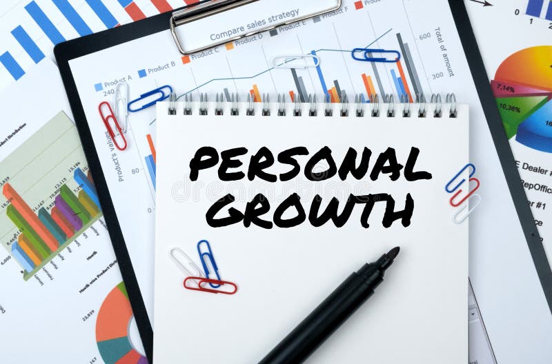 On the Table are Reports, Charts, a Notebook with the Inscription ...