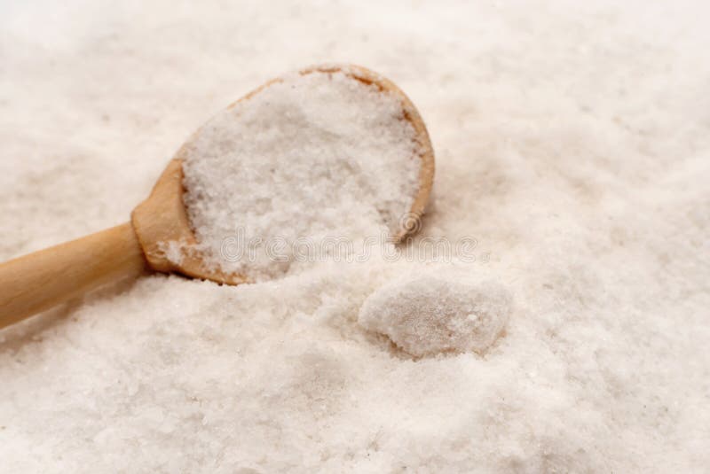 Table. Salt. Salt in a Spoon is Scattered on the Table Stock Photo ...