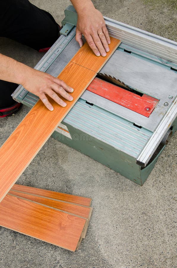 Table saw cutting a board stock photo. Image of manual - 24736878
