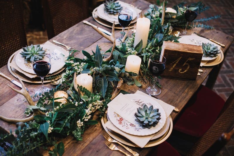 A Table Scape Designed for a Boho Style Event with Rustic Touches Stock ...