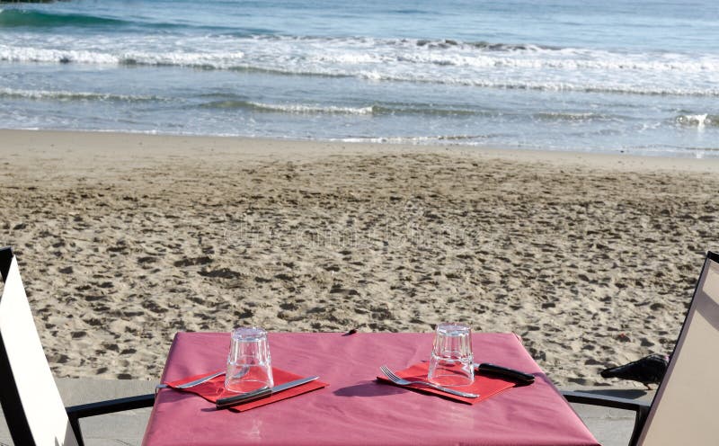 Table on the sea stock image. Image of light, beach, dishes - 23132851