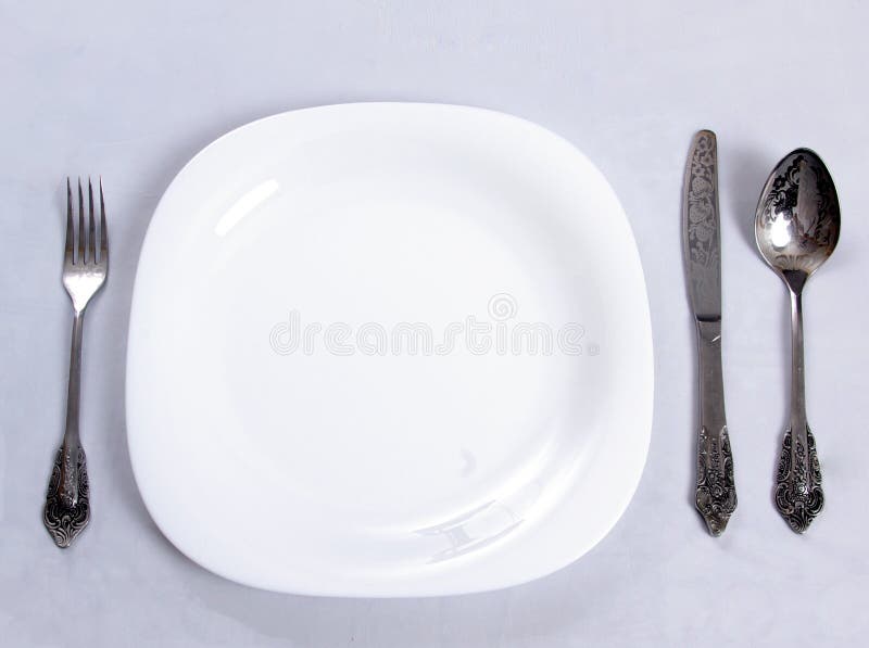 Plate and cutlery set stock photo. Image of plate, steel - 16653760