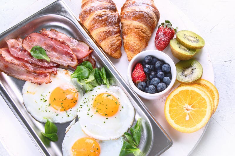 Table set for breakfast stock photo. Image of lettuce - 145977726