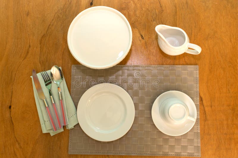 Table Set with Crockery and Kitchen Elements Stock Image - Image of ...