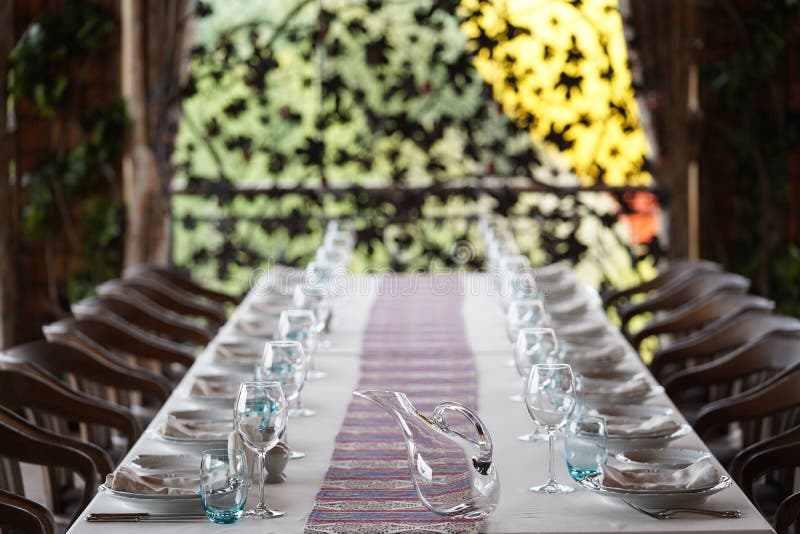 Table Set for Dining with Cutlery, Glassware and Wine Glasses Stock ...