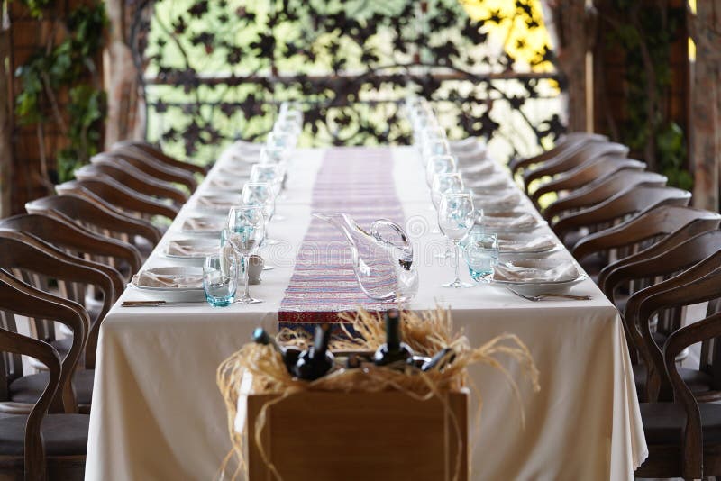 Table Set for Dining with Cutlery, Glassware and Wine Glasses Stock ...