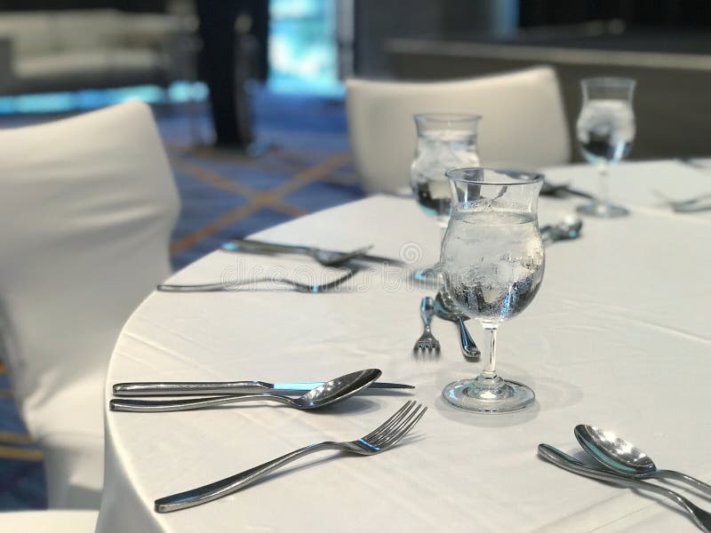 Table Set for a Dinner in a Restaurant with a Glass of Water Stock ...