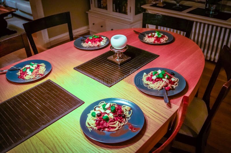 Table Set with Five Plates of Spaghetti, Tomato Sauce, Mozarella and ...