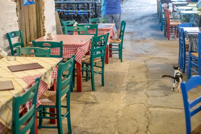 Table Set at Night, Colorful Tables and Wooden Chairs Stock Image ...