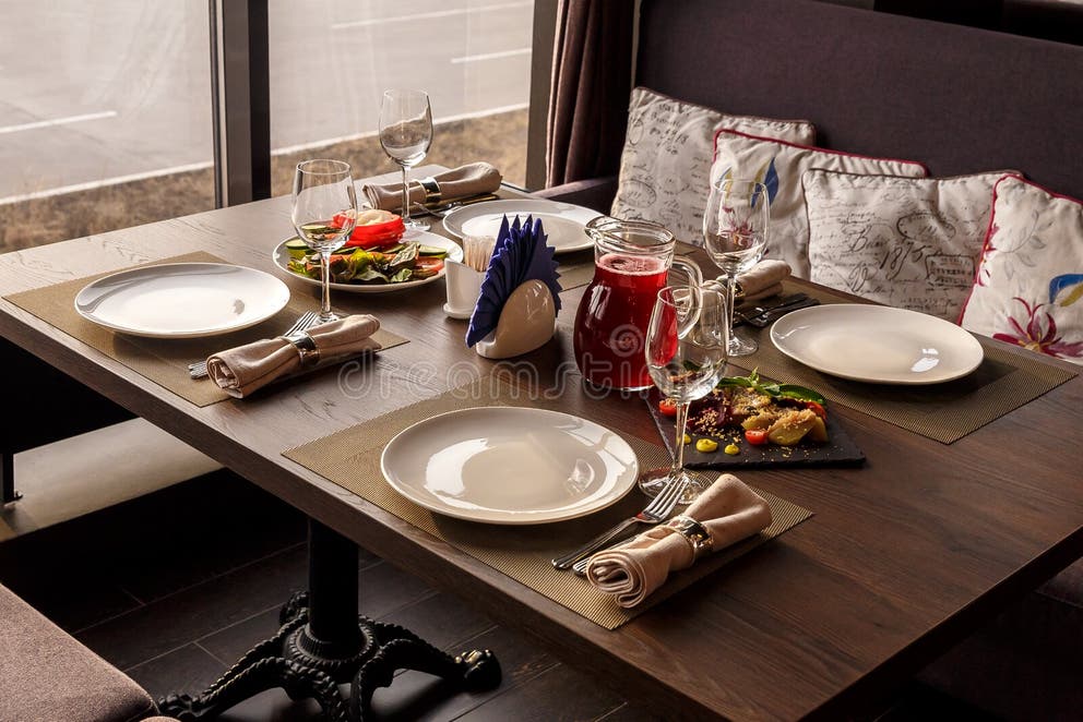 Table Set in the Restaurant Near the Window Stock Photo - Image of ...
