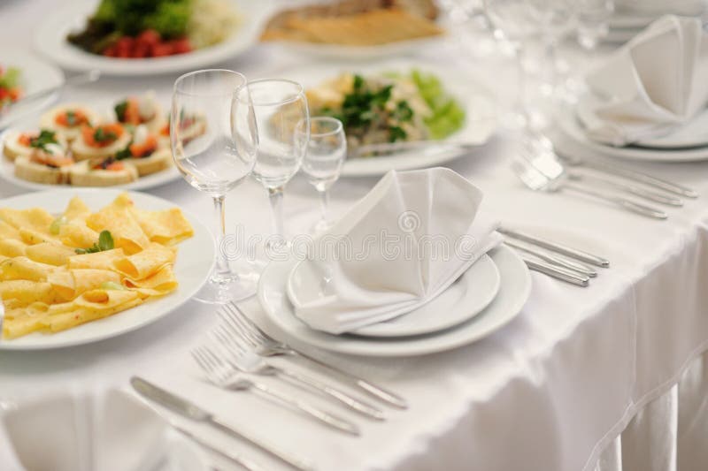 Table Set Service with Silverware and Glass Stemware at Restaurant ...