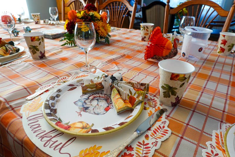 Table Set for Thanksgiving Dinner with Decorative Paper Plates, Napkins ...