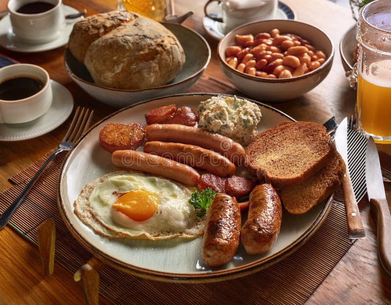 A Table Set for a Traditional Irish Breakfast, Featuring Sausages ...