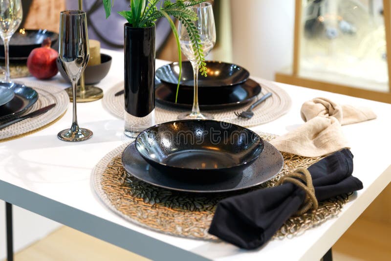 Table Setting with Black Dishes for a Festive Romantic Dinner or ...