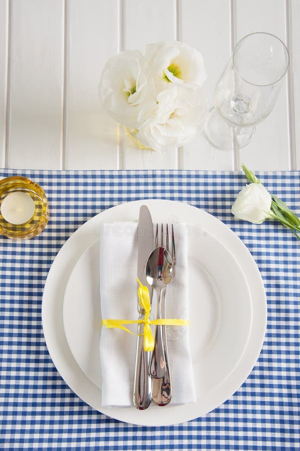 Table Setting with Blue Checkered Tablecloth, White Napkin and Y Stock ...