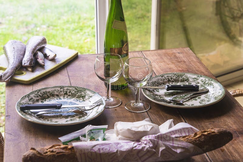 Table Setting for Dinner or Lunch: Two Plates, Forks, Knives, Glasses ...