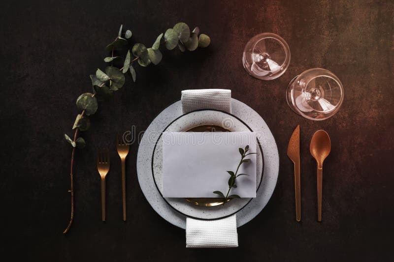 A Table Setting for an Elegant Dinner in Copper and Black Stock Photo ...