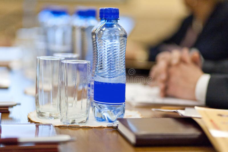 Table Setting for Meetings. Mineral Water, Folder, Pen. Stock Photo ...