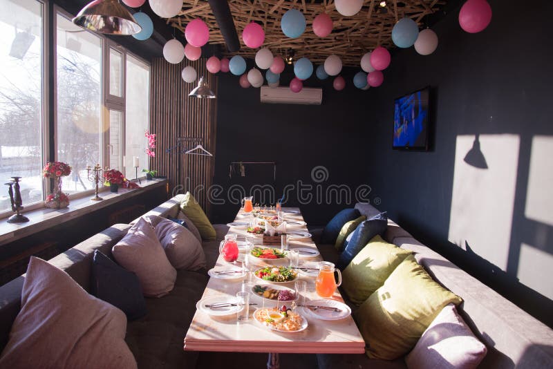 Table Setting For A Party Or Banquet In A Cozy Small Room. There Are ...