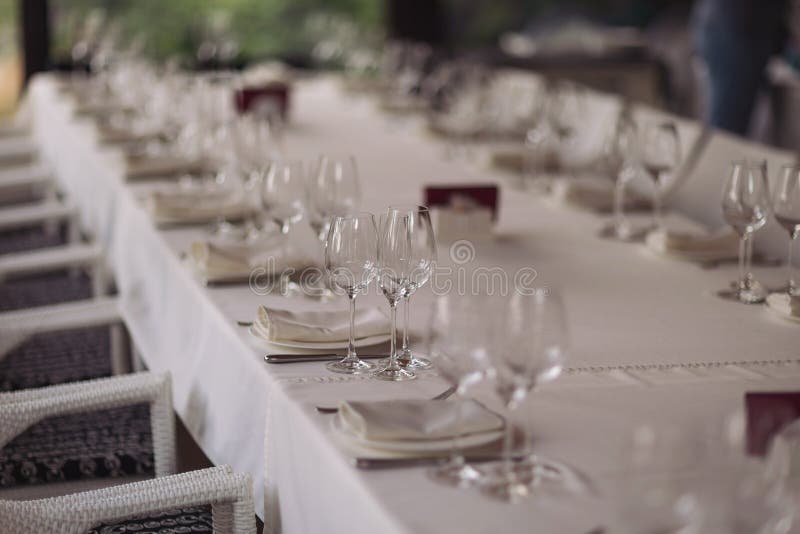 Table Setting for a Party or Wedding Reception in a Restaurant. Row of ...