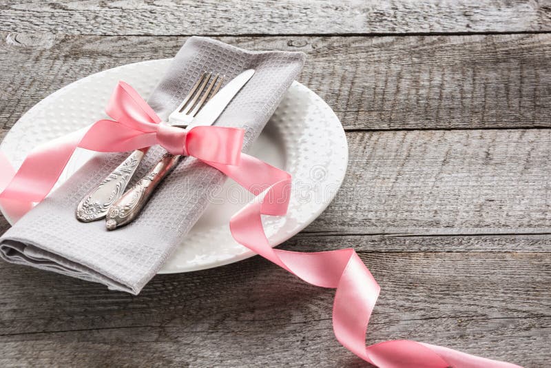 Elegance Table Setting with Pink Ribbon on Wooden Board. Rustic Stile ...