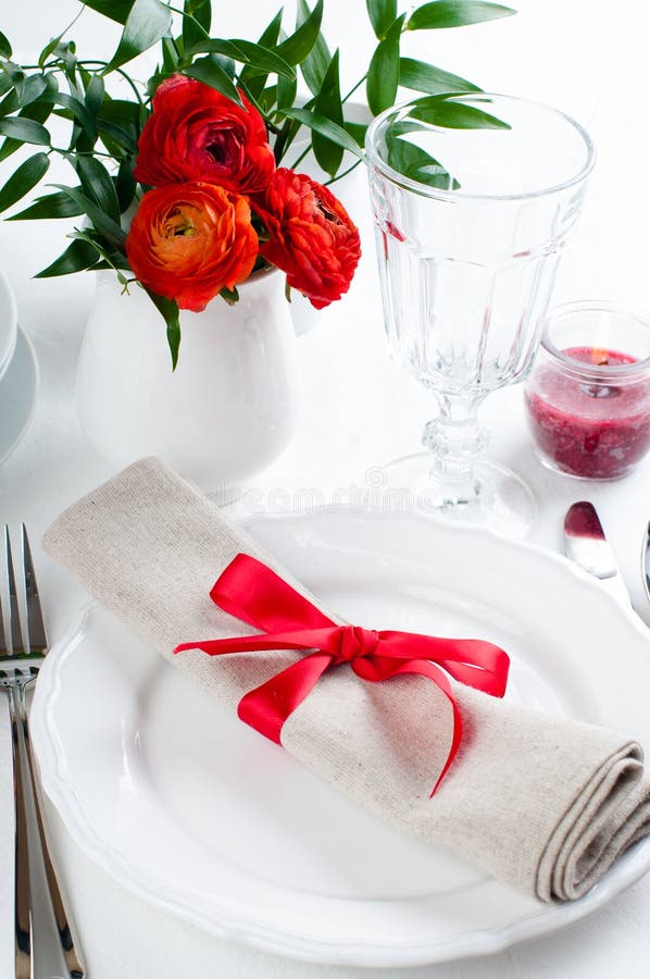 Table Setting with Red Flowers Stock Photo - Image of glass ...