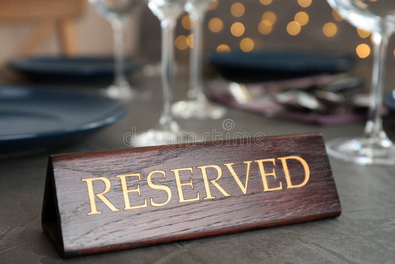 Table Setting with RESERVED Sign Stock Image - Image of occupied, gold ...
