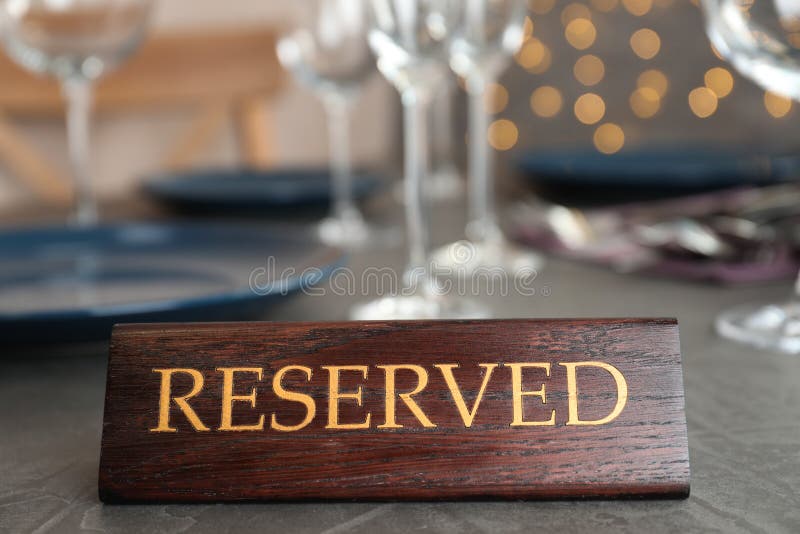 Table Setting with RESERVED Sign Stock Image - Image of meal, sign ...