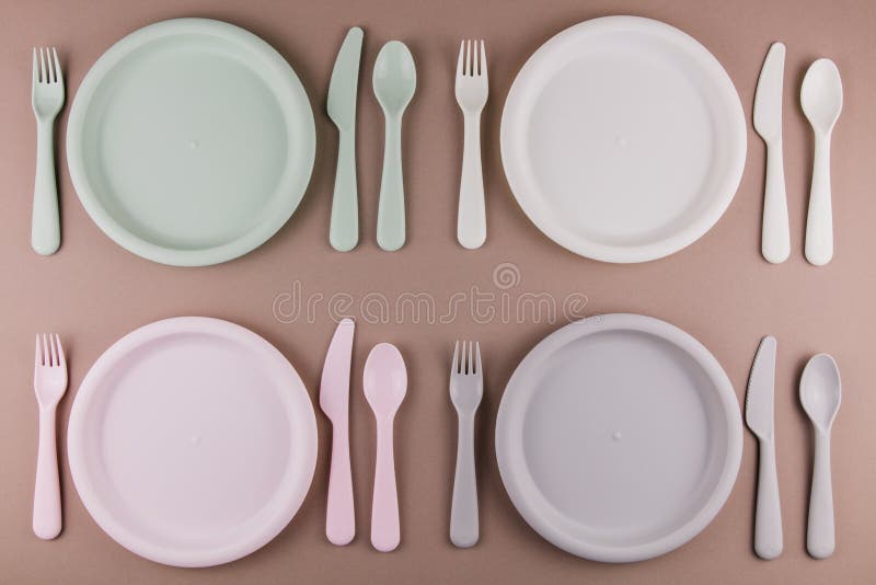 Table Setting in a Restaurant for Four Persons with a Plate Spoon Fork ...