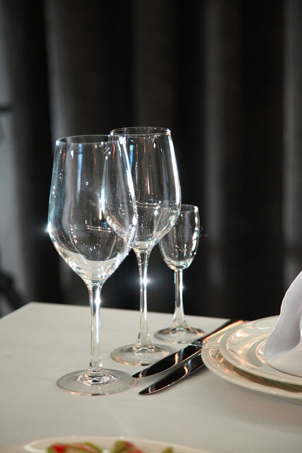 Table Setting in a Restaurant. Table Setting with Glasses, Cutlery and ...