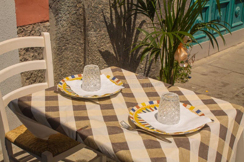 Table Setting at the Restaurant Serving for Two People in the Sunny Day ...