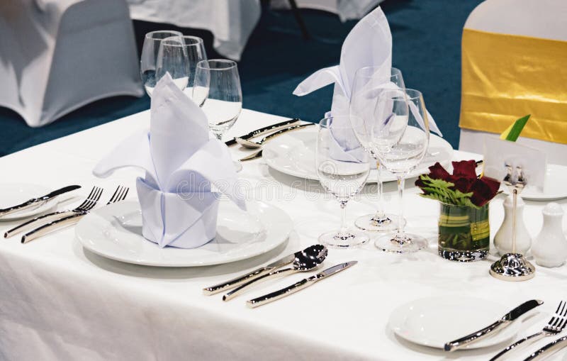 Table Setting in the Restaurant, Water in the Grass on the Dining Table ...