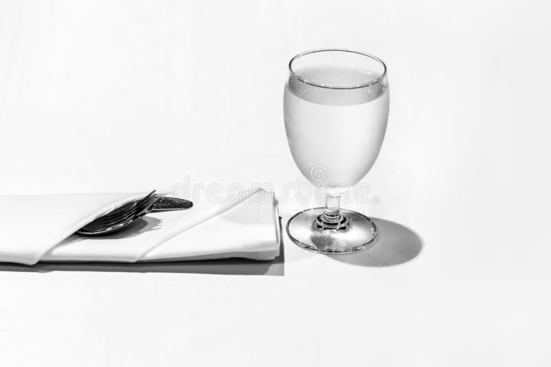 Table Setting in the Restaurant, Water in the Grass on the Dining Table ...