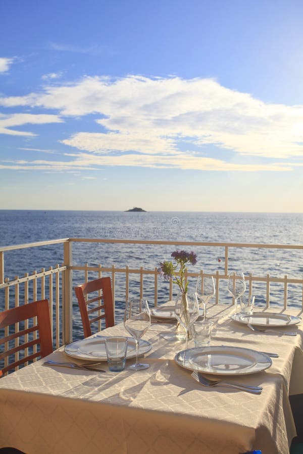 Table setting by the sea stock photo. Image of party - 22507742