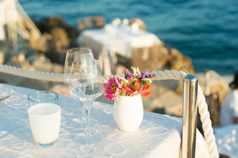 Table setting by the sea stock image. Image of lifestyle - 76182729