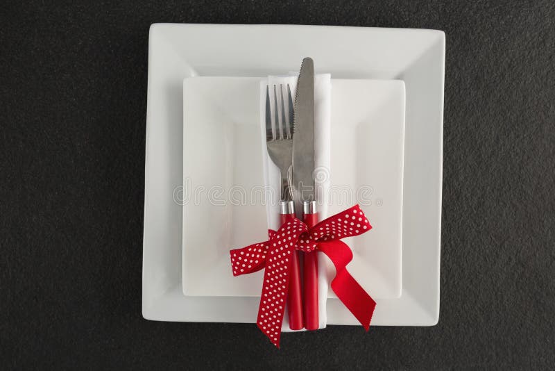 Table Setting with Square Plates and Cutlery Stock Photo - Image of ...