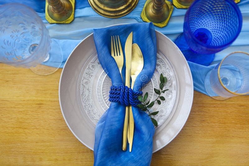 Table Setting in Vintage Style in Golden and Blue Colors Stock Image ...